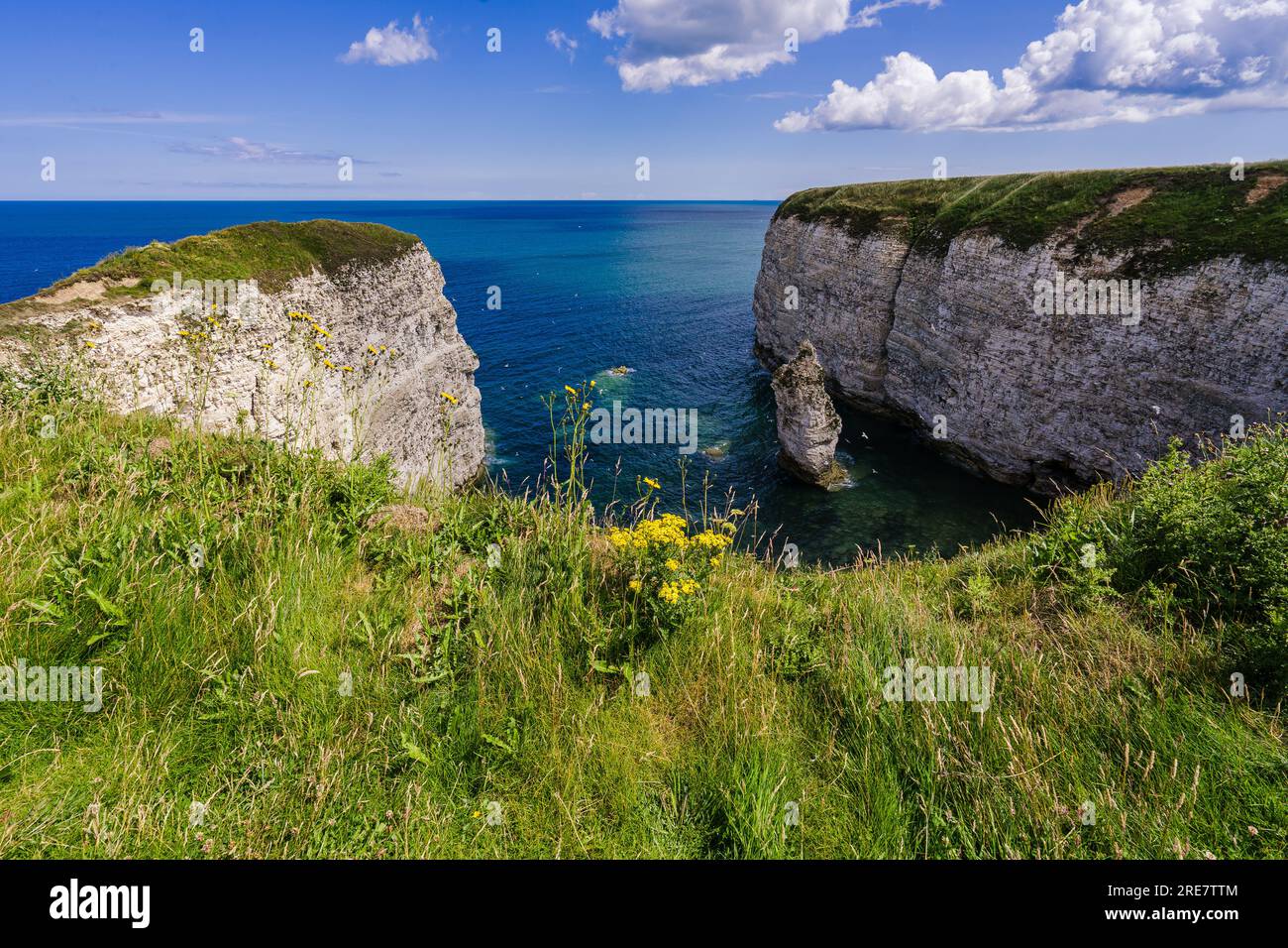 View from the clifftop - a bay and seastack close to Flamborough Head ...