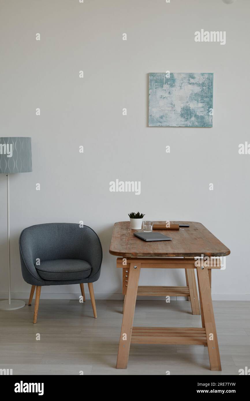 Vertical background image of minimal home interior with home office ...