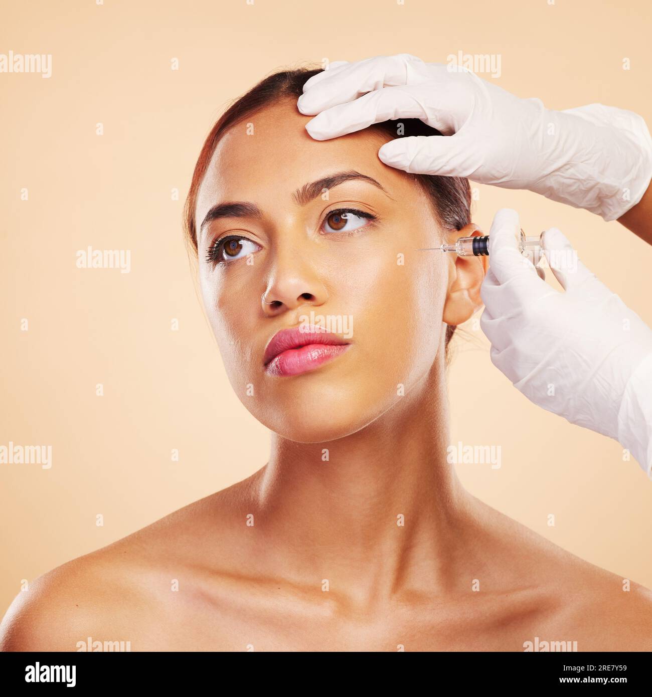 Hands, woman or plastic surgery injection for facelift or cosmetics isolated on studio ...