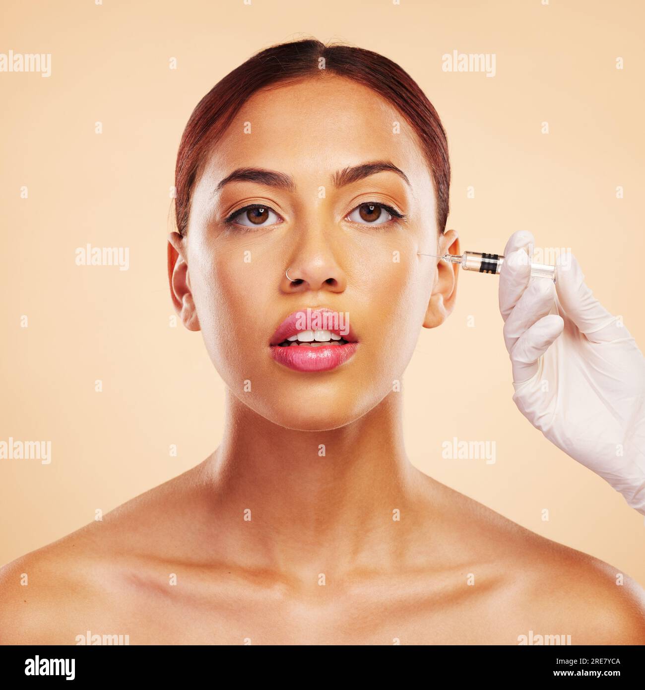 Portrait, woman or plastic surgery with facelift injection or cosmetics isolated on studio ...