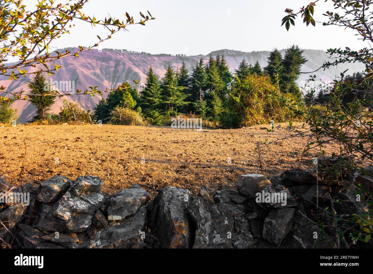 Breathtaking view of Uttarakhand's Himalayan region with stone walls ...