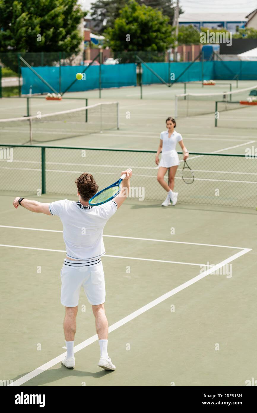 Hitting tennis ball hi-res stock photography and images - Alamy
