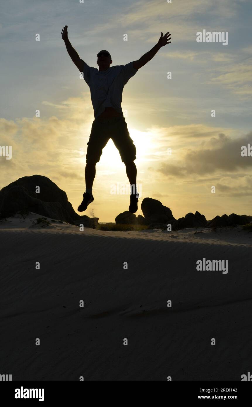 Silhouette man raised up arms beautiful hi-res stock photography and ...