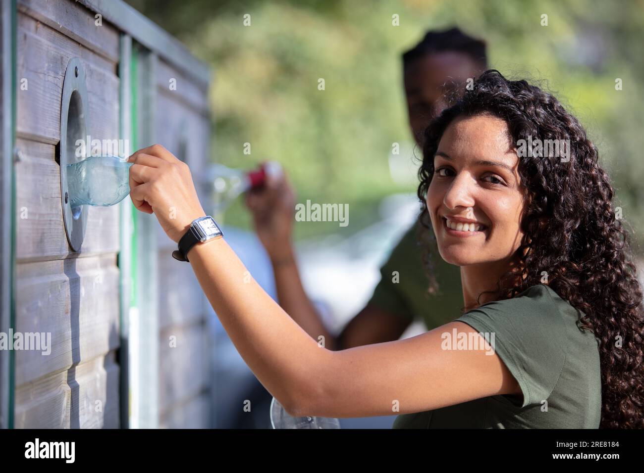 Man recycling glass bottles hi-res stock photography and images - Alamy