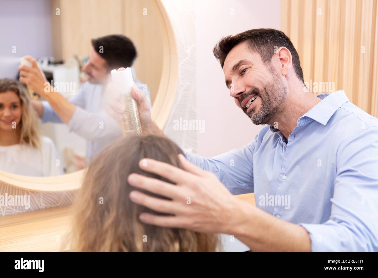 daily situation in a hair salon full Stock Photo - Alamy