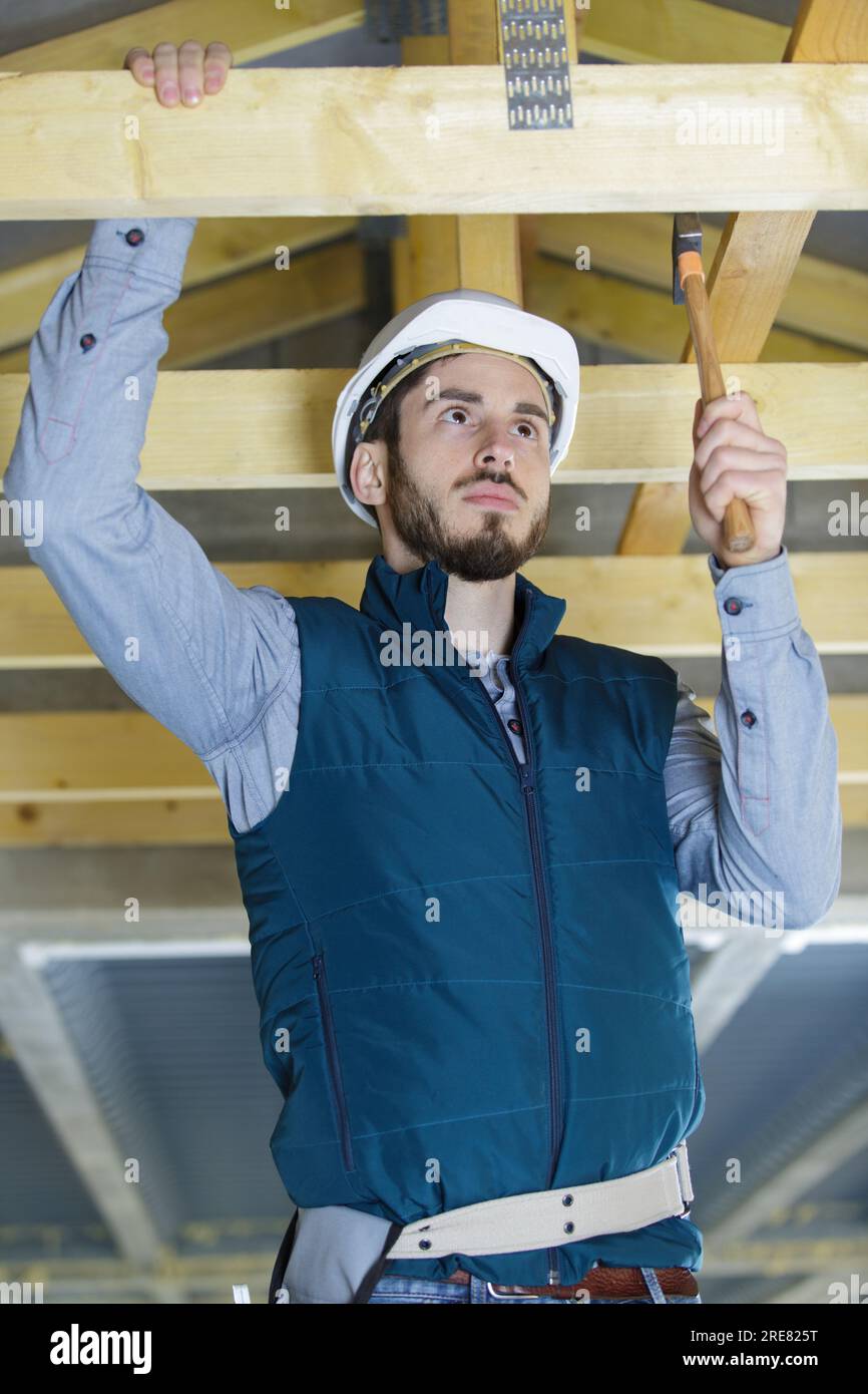 Men using hammer nail hi-res stock photography and images - Alamy