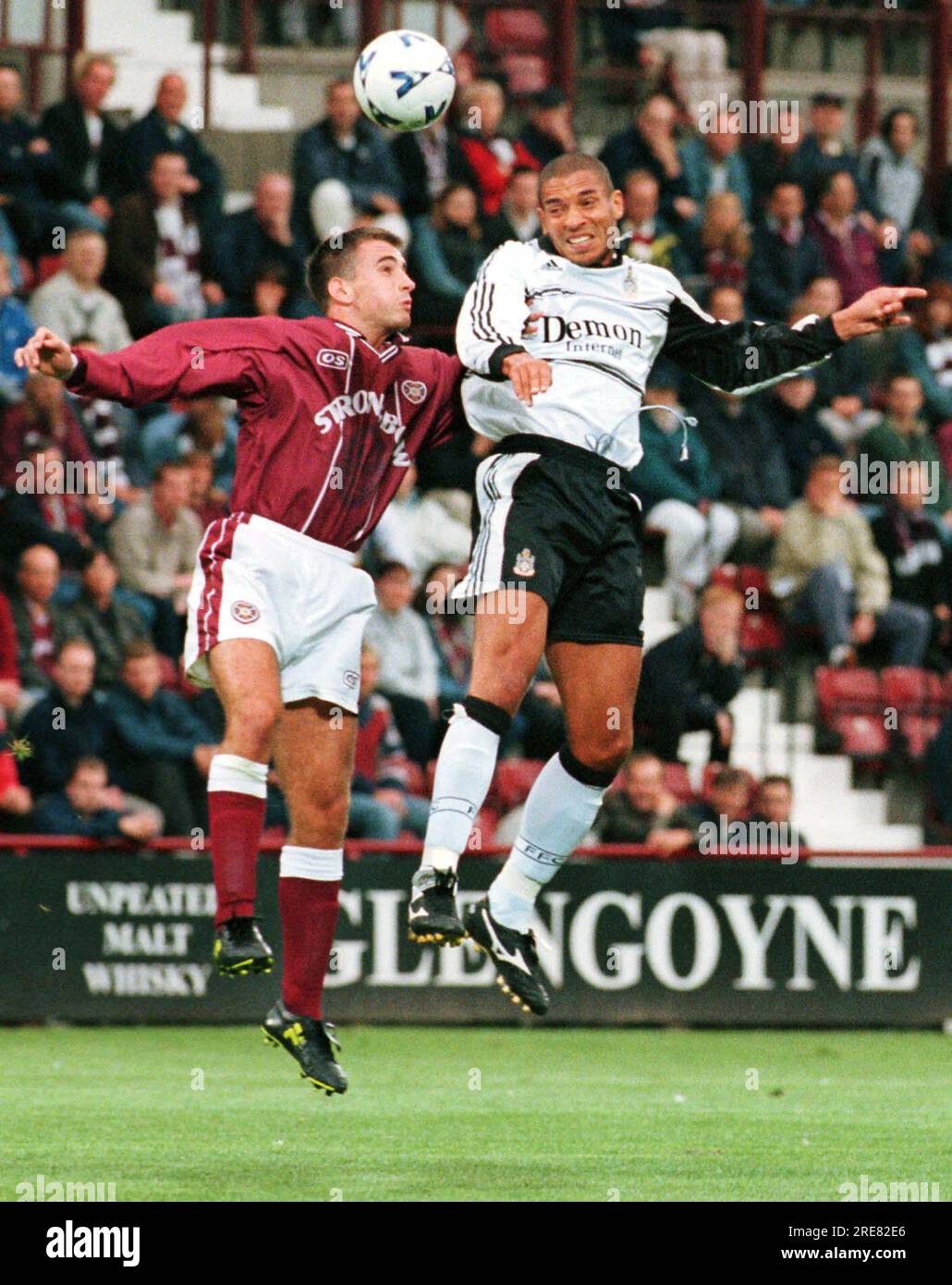 HEARTS V FULHAM. 21/7/99 Stan Collymore and Paul Ritchie compete for a ...
