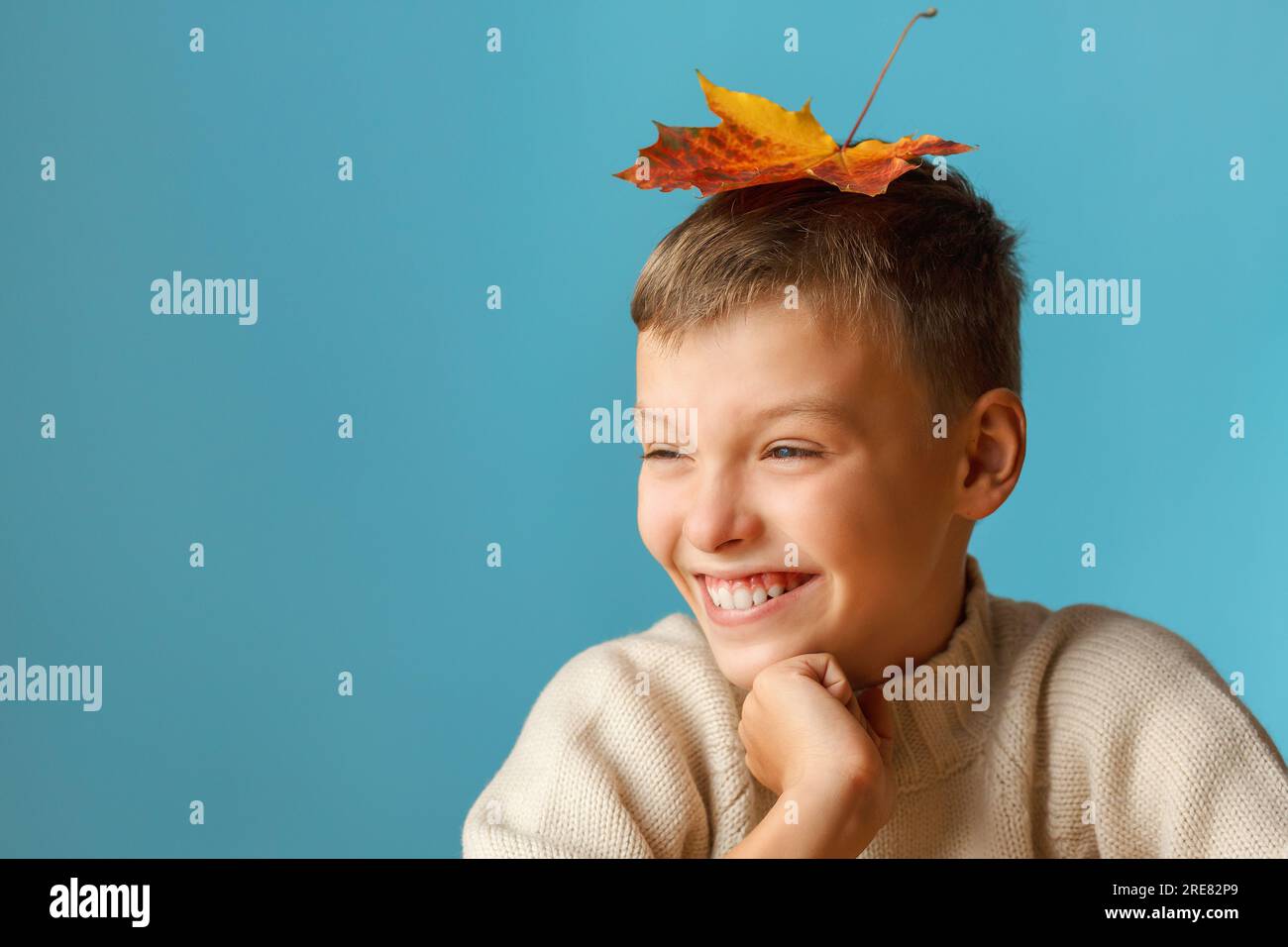 Kid with fall leaf on her head hi-res stock photography and images - Alamy