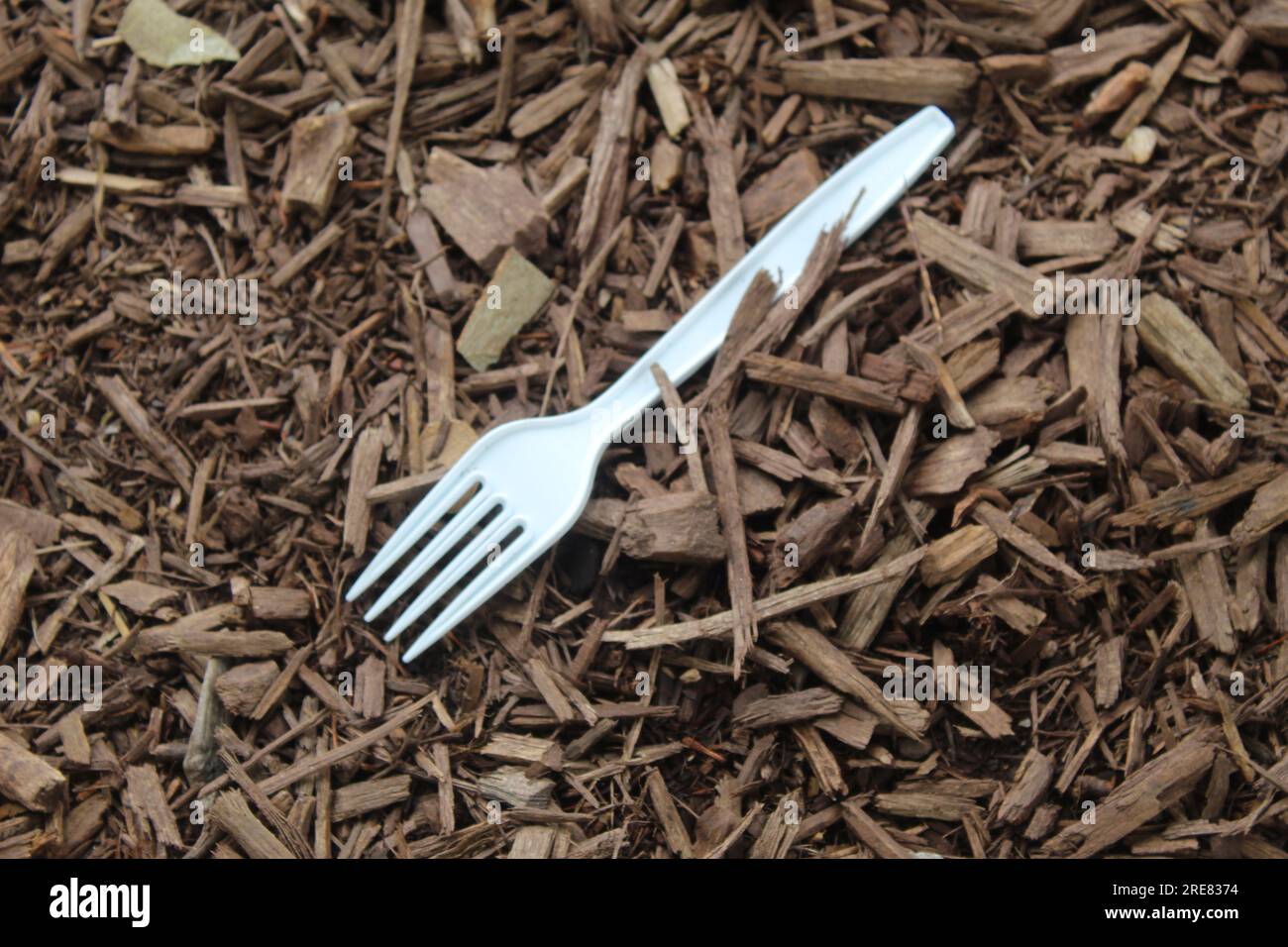 A photo of a fork on a ground of bark and wood Stock Photo - Alamy