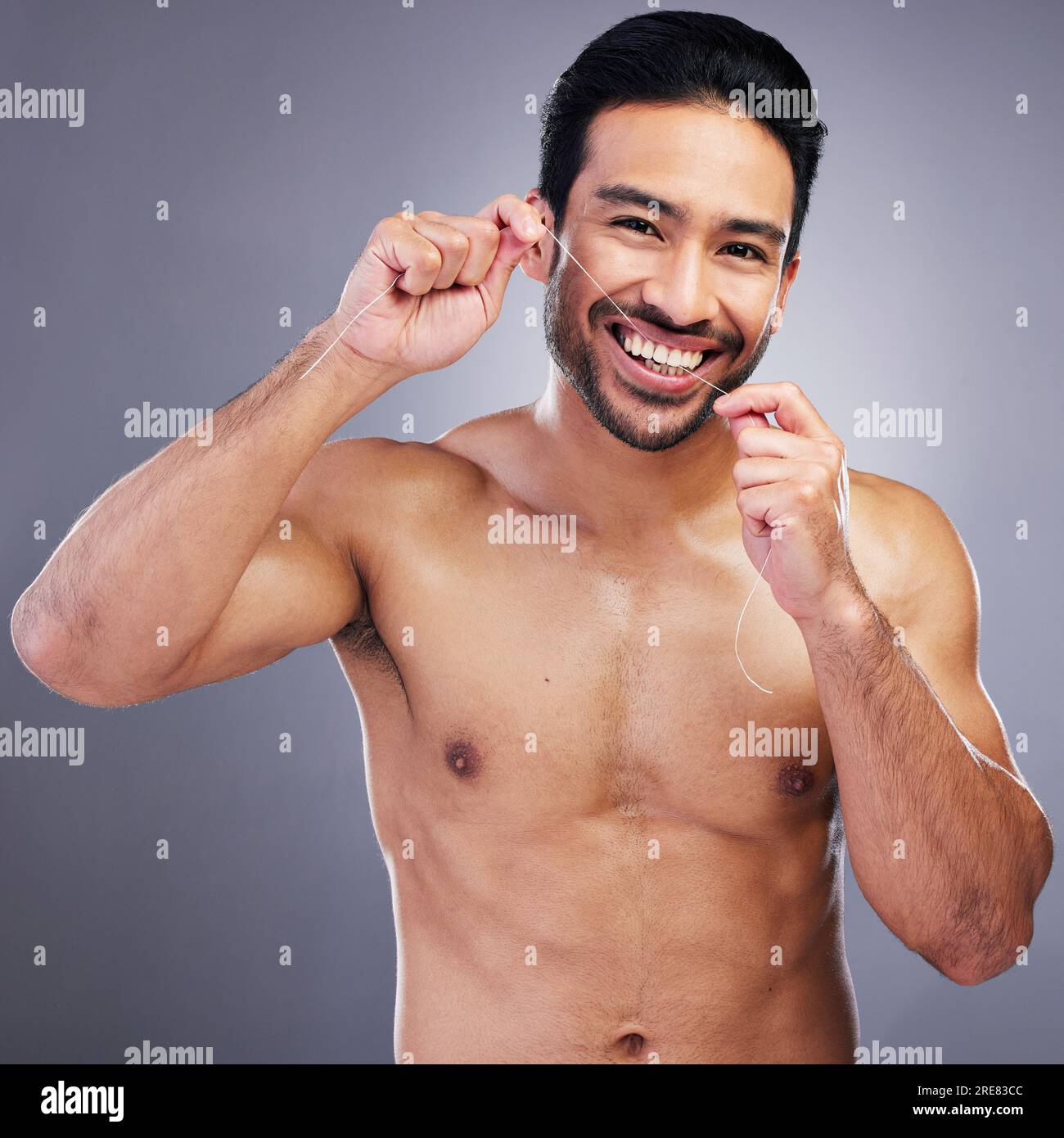 Teeth cleaning, floss and studio portrait of happy man with oral ...