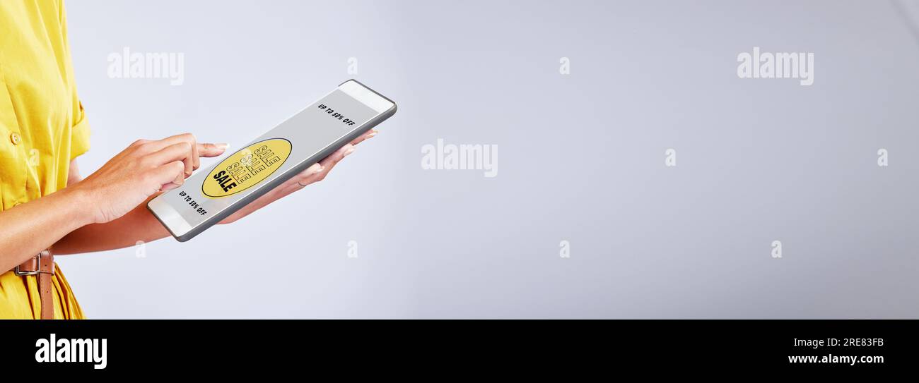 Tablet, online shopping and closeup of woman in studio scrolling on ...