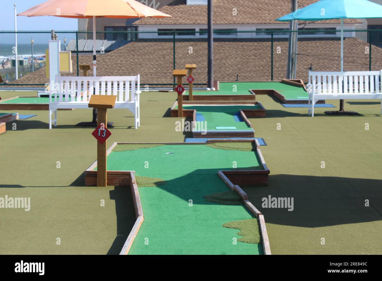 A photo of a mini golf course on a roof on a hot sunny day in Delaware ...