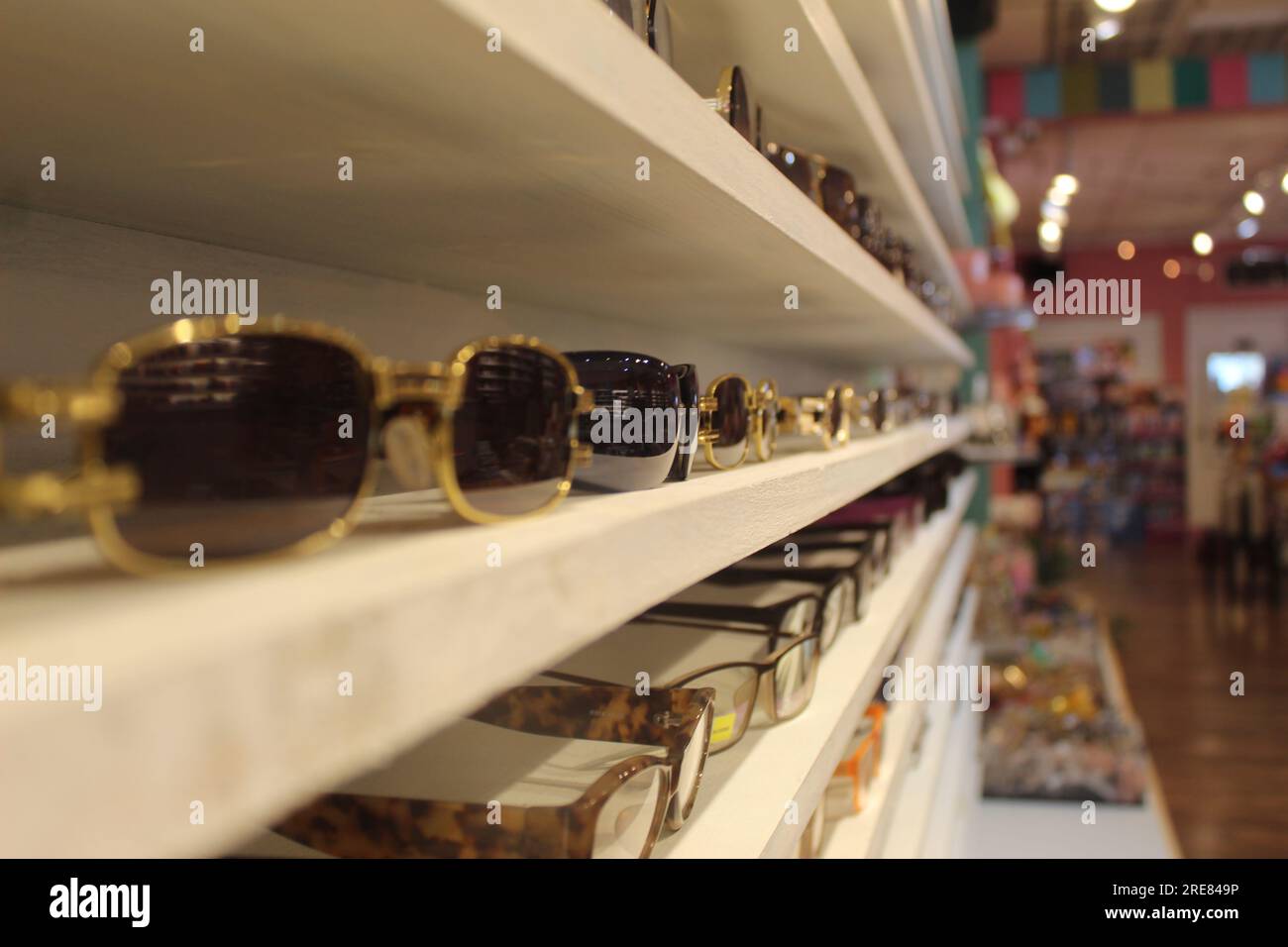 A close up photo of sunglasses on display in a store in the USA Stock ...