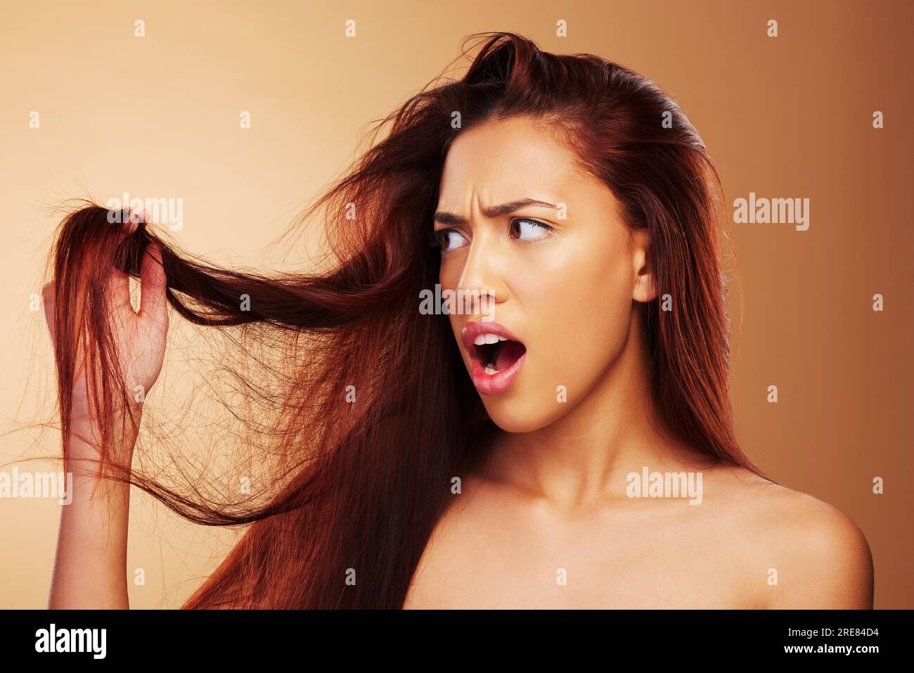 Damaged, hair and a woman upset in studio about salon, split end and ...