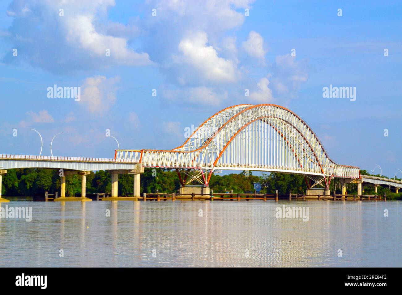 The Tayan Bridge arch is a bridge that crosses the Kapuas River and is ...