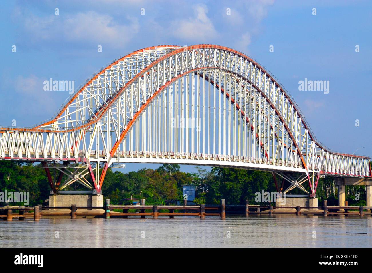 The Tayan Bridge arch is a bridge that crosses the Kapuas River and is ...