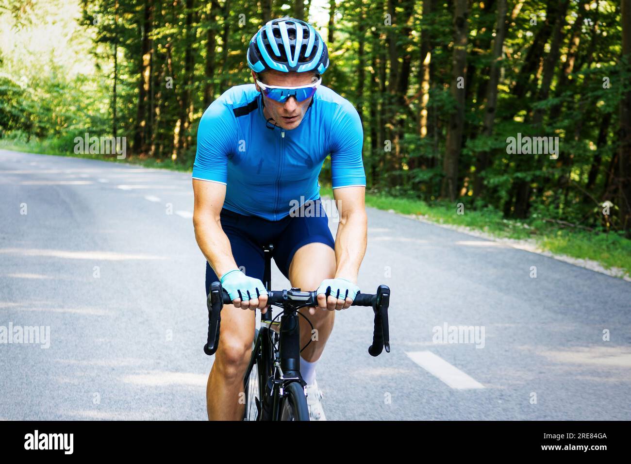 Man training hard on bicycle hi-res stock photography and images - Alamy