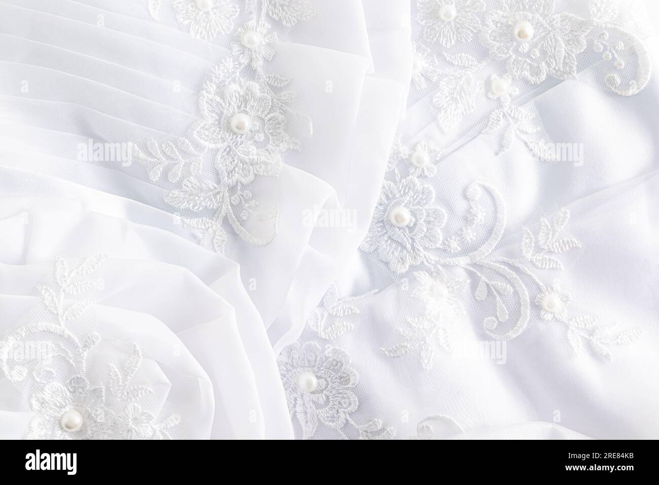 The fabric details of the bride's dress, the beautiful embroidery and ...