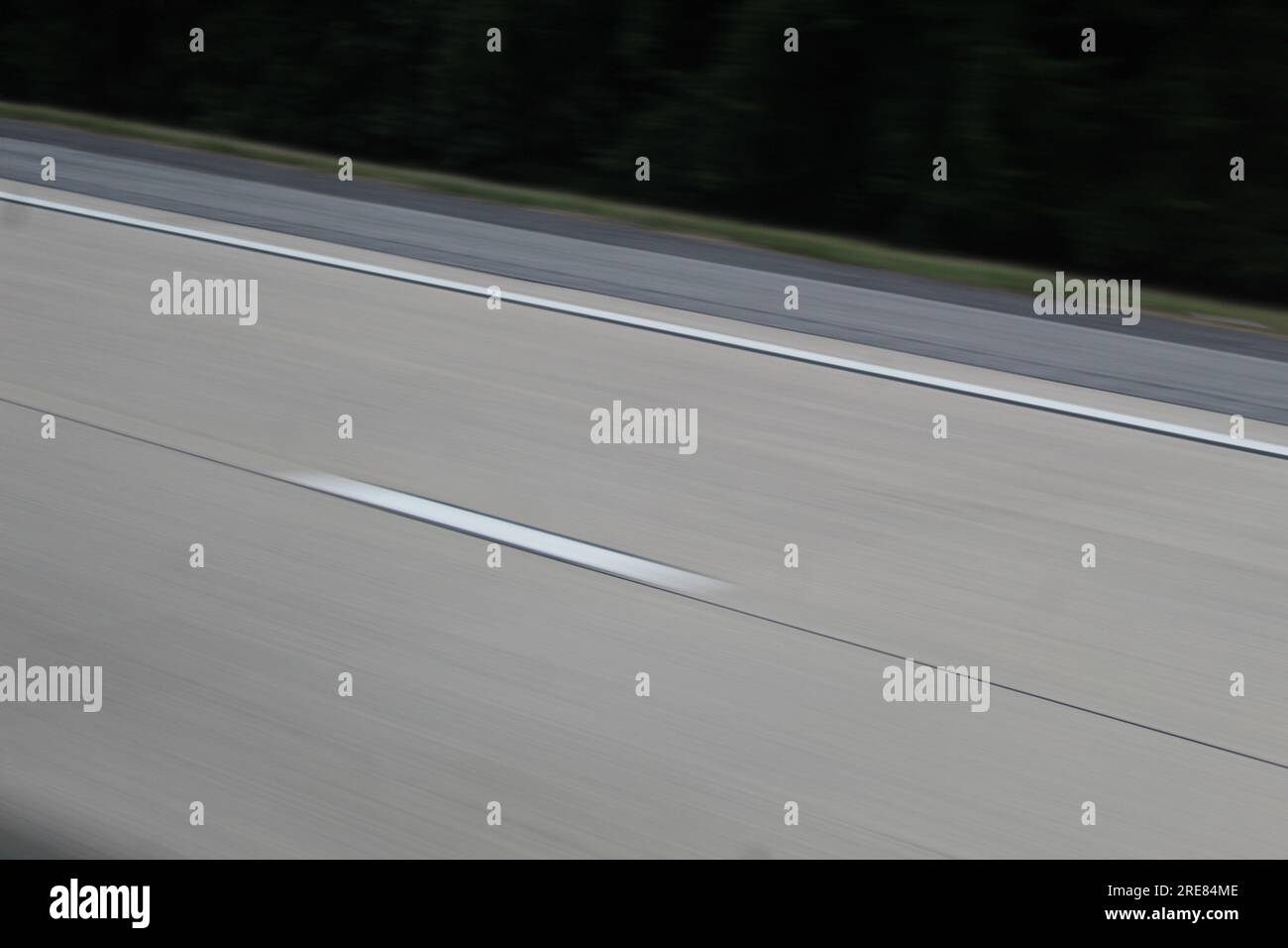 A photo of a motorway road from the perspective of someone is in a car ...