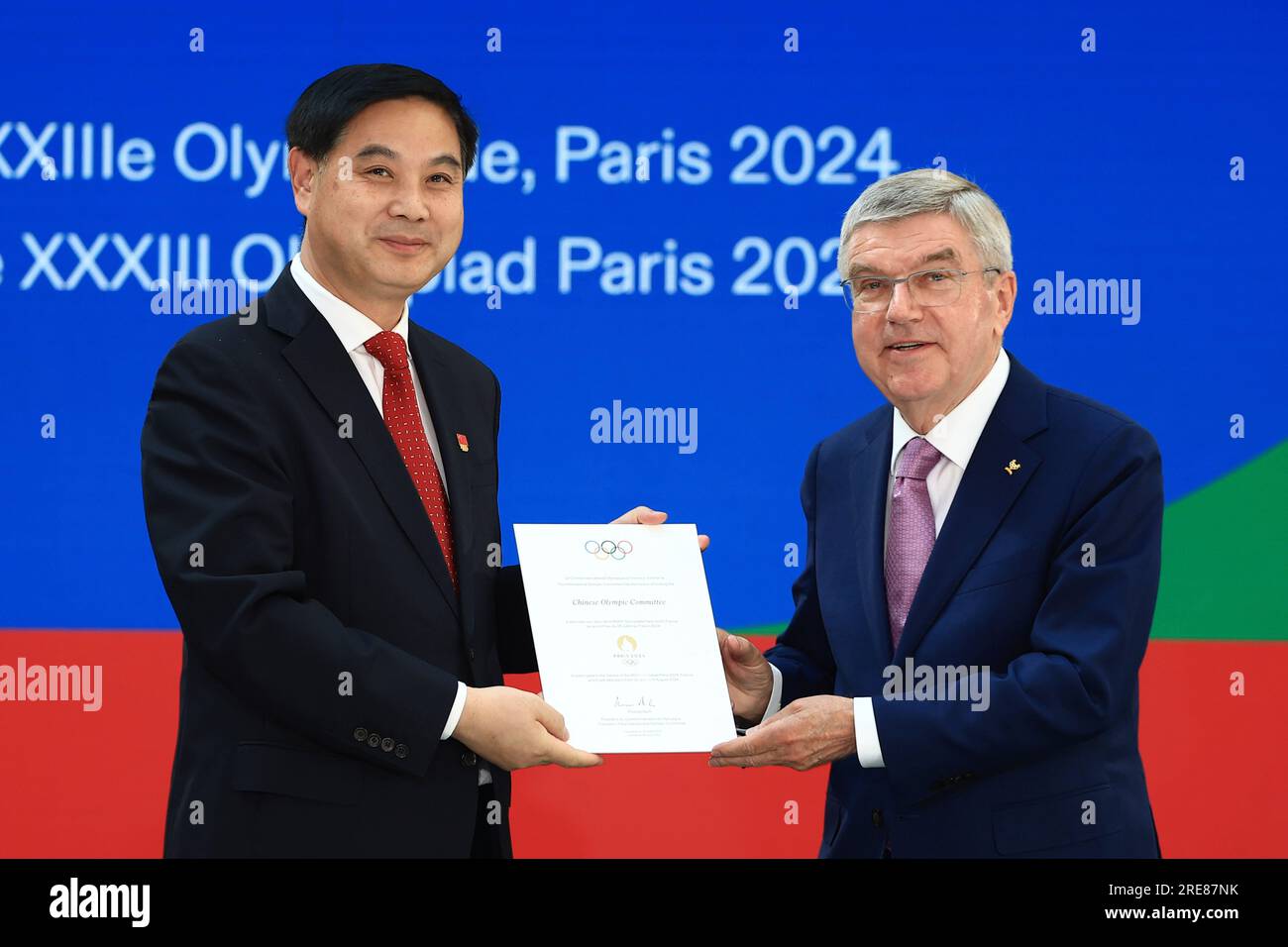 International Olympic Committee (IOC) president Thomas Bach and Gao ...