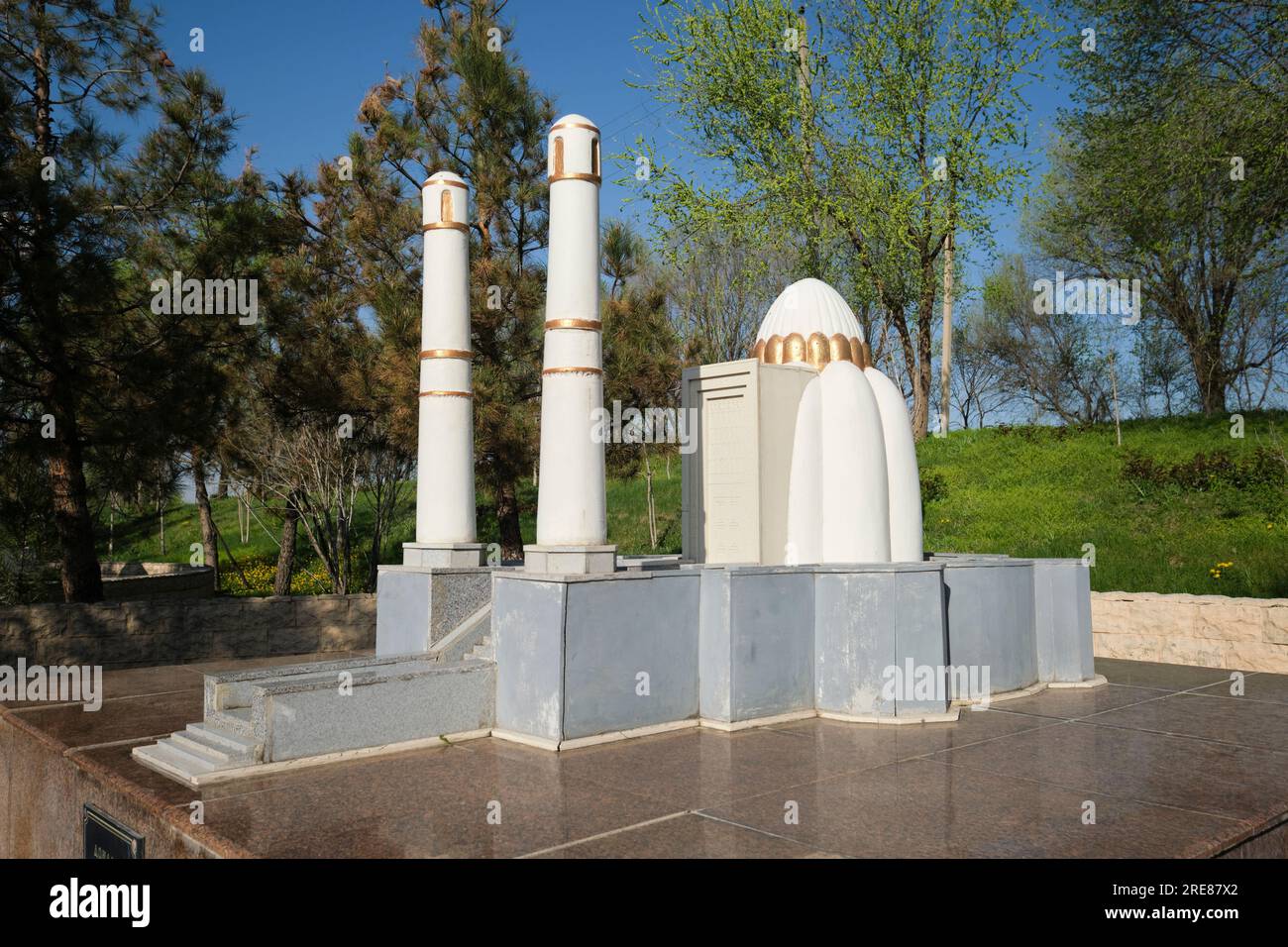 A view of the unique, white, moderne masoleum of Aomaak. A diorama ...