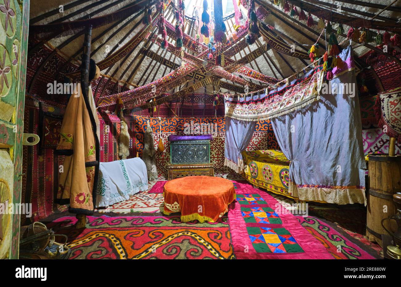 View inside a typical yurt tent, home, details of rich, colorful ...