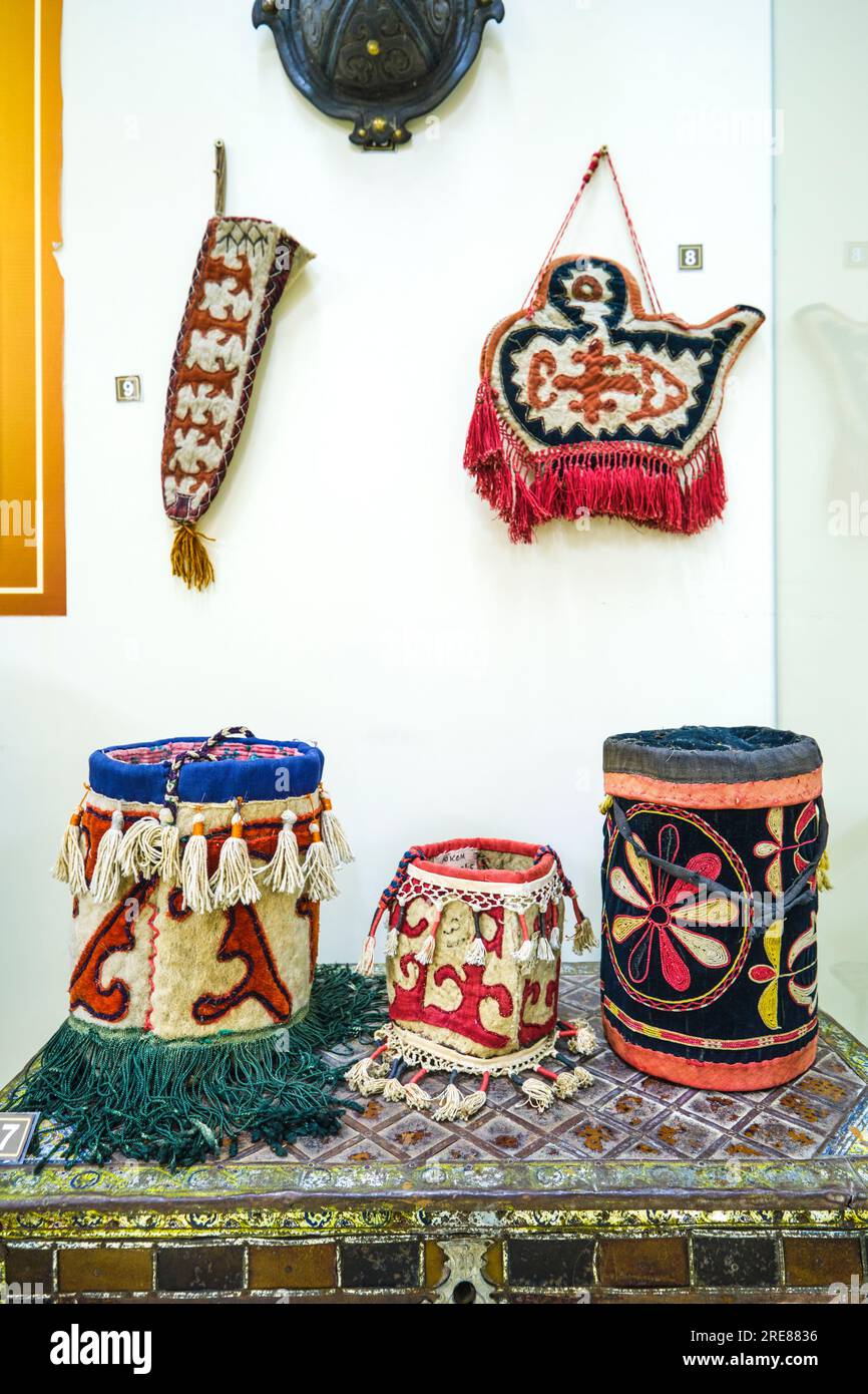 A display of various wool felt, colorful, decorative drum, sheath ...
