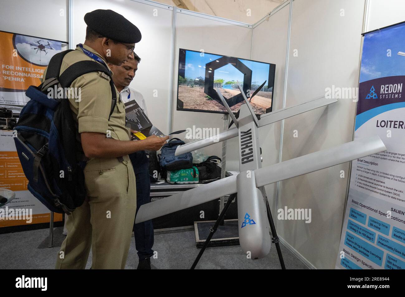 A delegate inspects Achuk, an unmanned aerial vehicle loitering ...