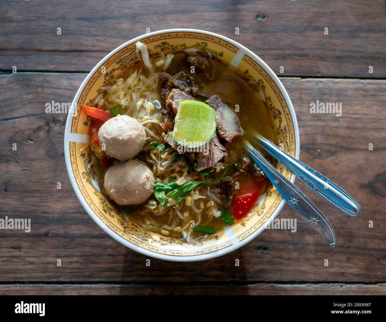 Soto Bakso, an Indonesian traditional meat soup with meat ball, top ...