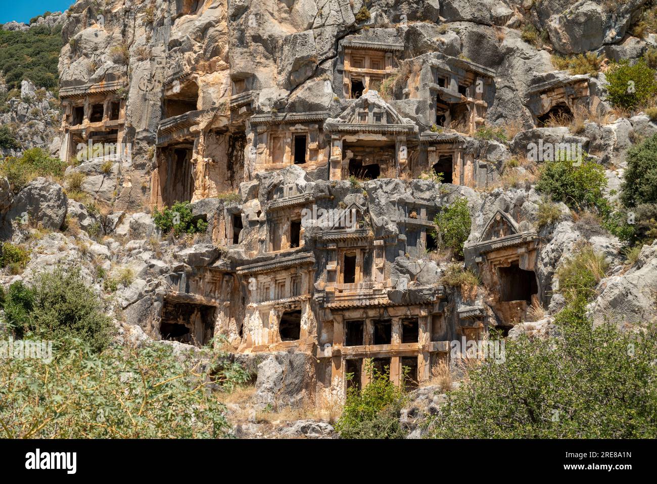 The ruins of the amphitheater and ancient rock tombs in the ancient ...