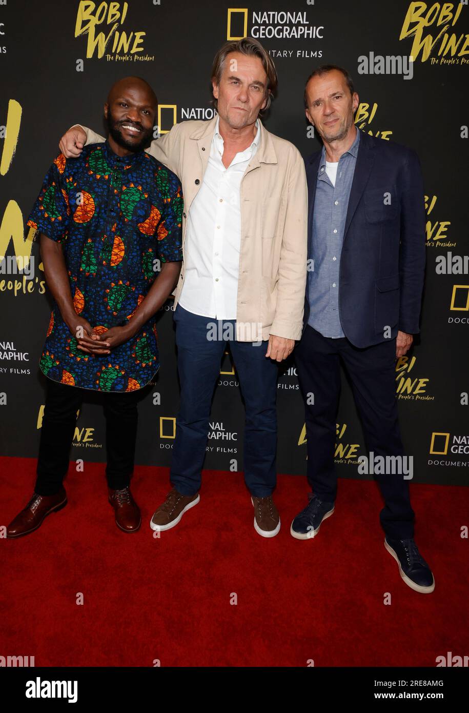 Beverly Hills, Ca. 25th July, 2023. Moses Bwayo, Christopher Sharp, John Battsek at the Los ...