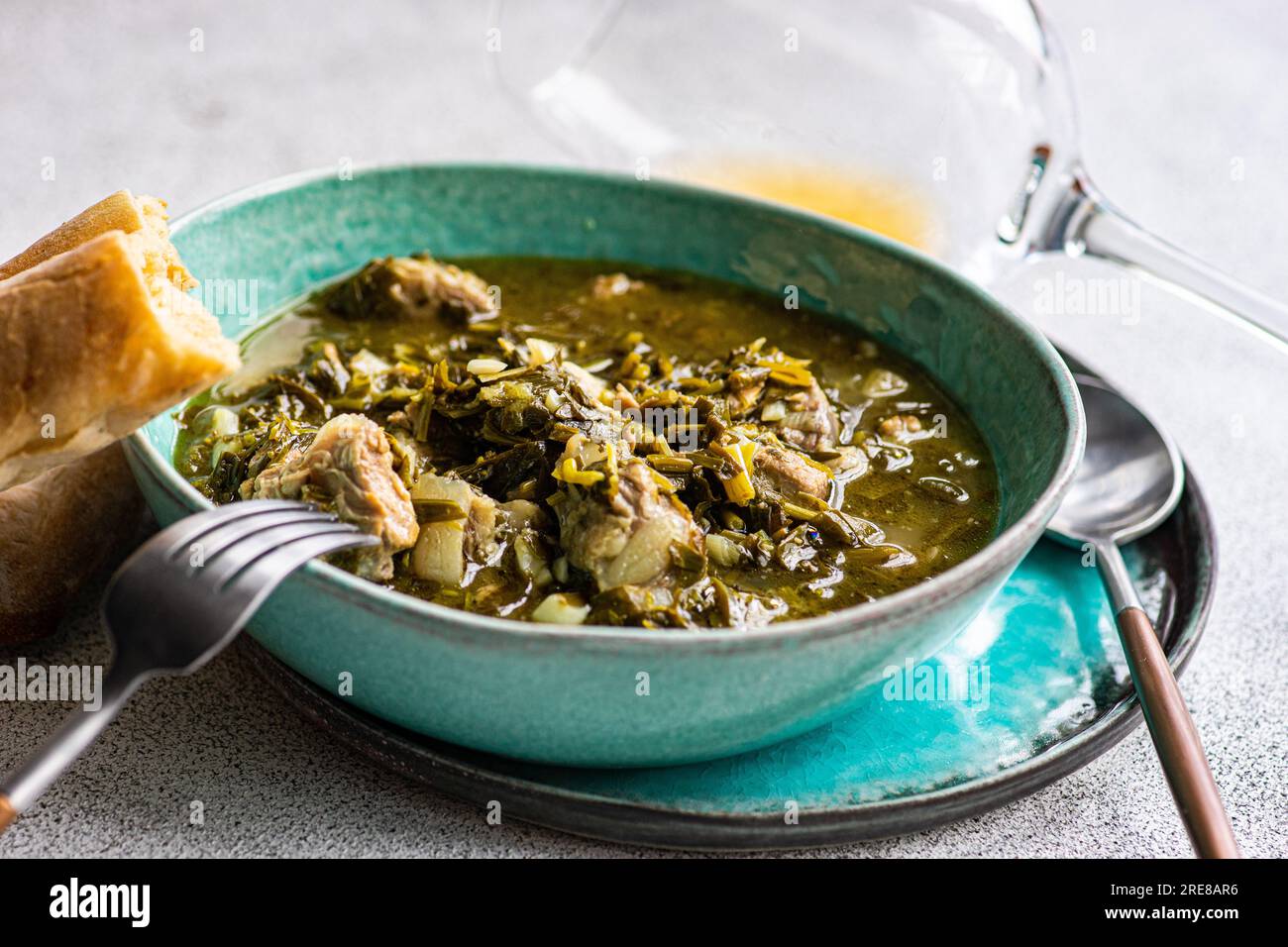 Traditional Georgian seasonal dish Chakapuli served in the bowl Stock ...