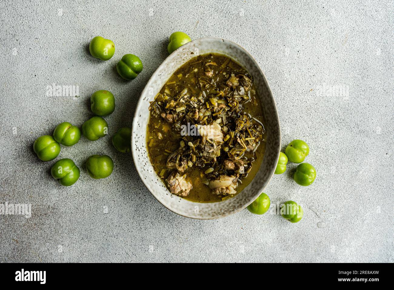 Traditional Georgian seasonal dish Chakapuli served in the bowl on ...