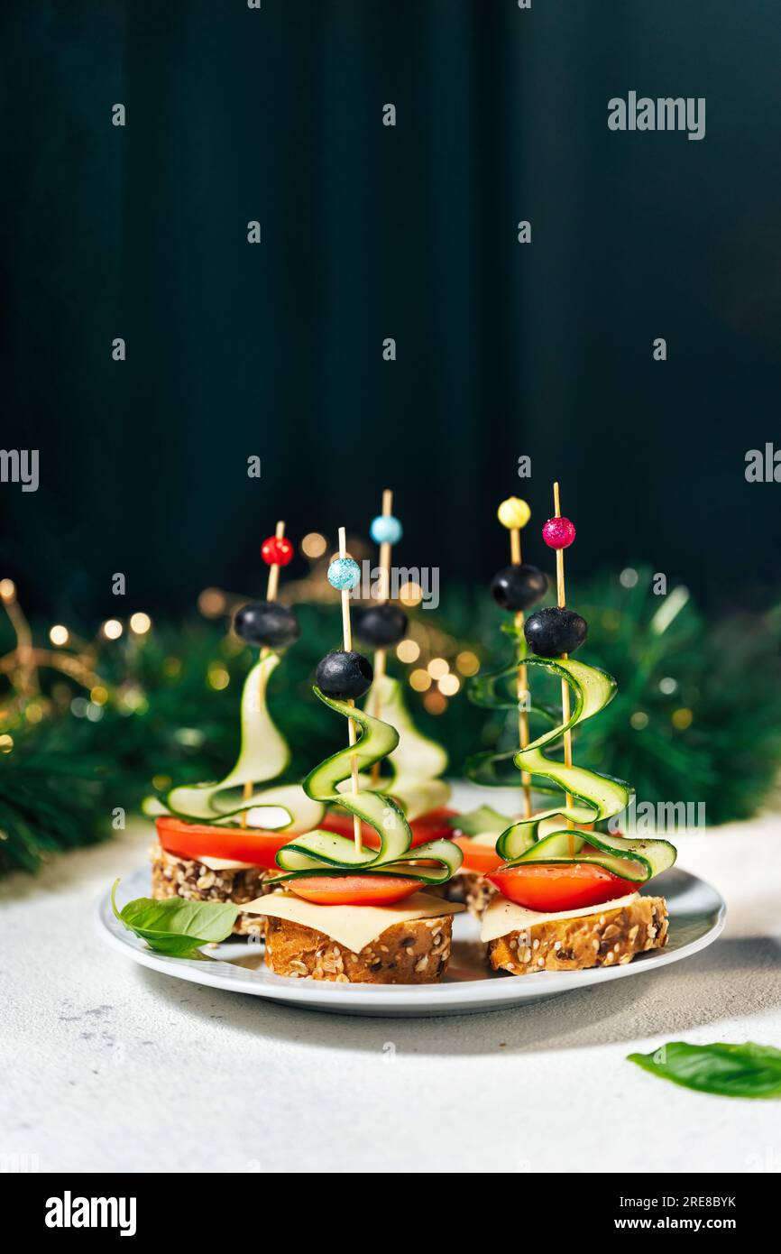 Festive Christmas canape on table Stock Photo - Alamy