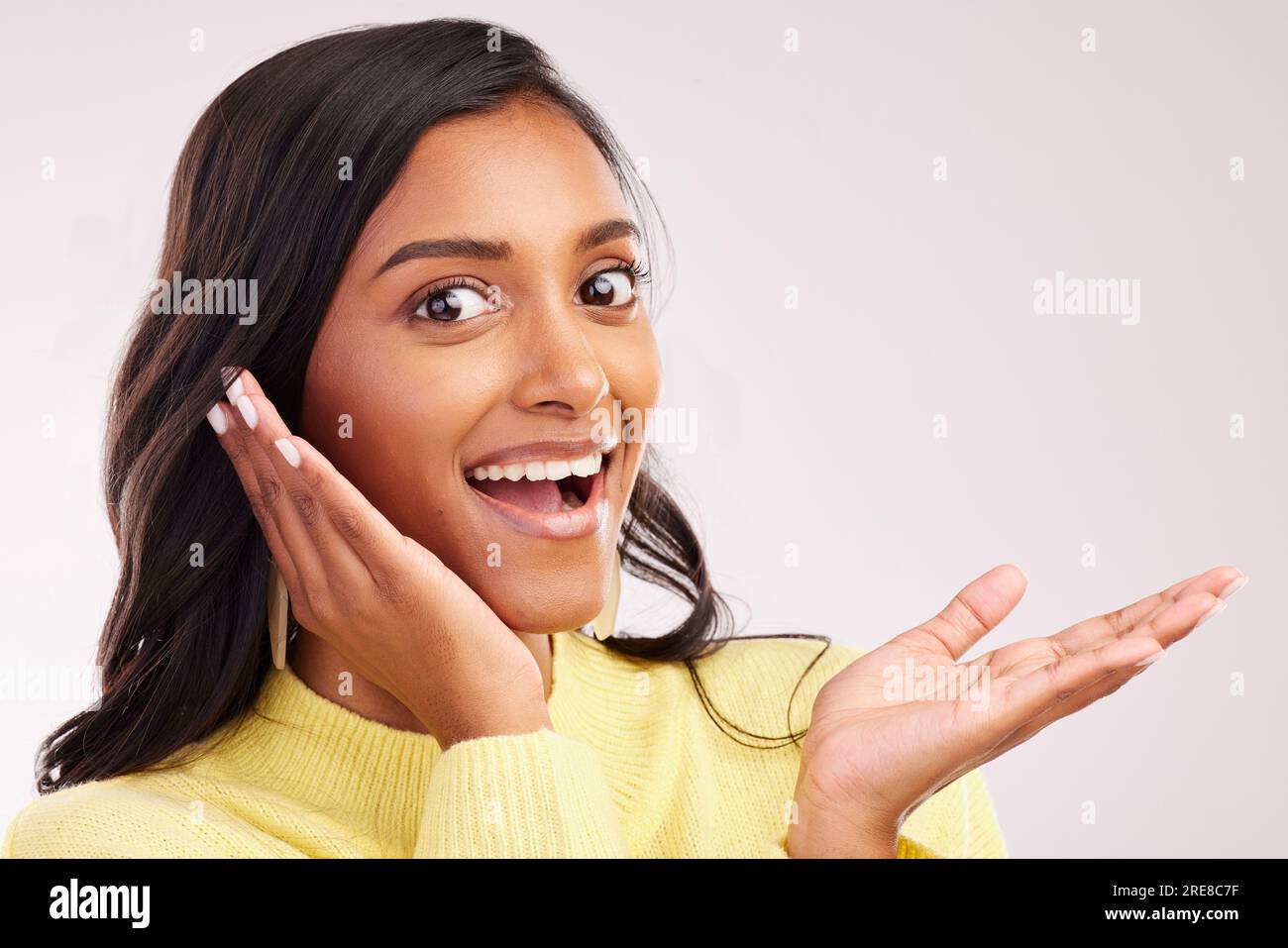 Excited, wow and portrait of a woman on a studio background with mockup ...