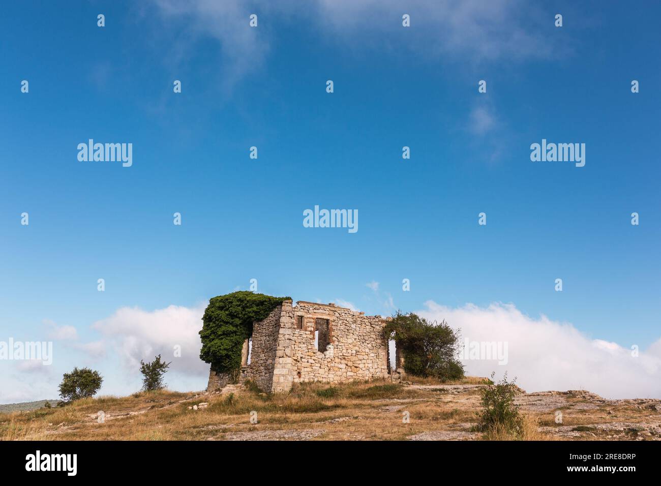 ruins of a house in La Mussara ,Tarragona, Spain, above everything on a ...