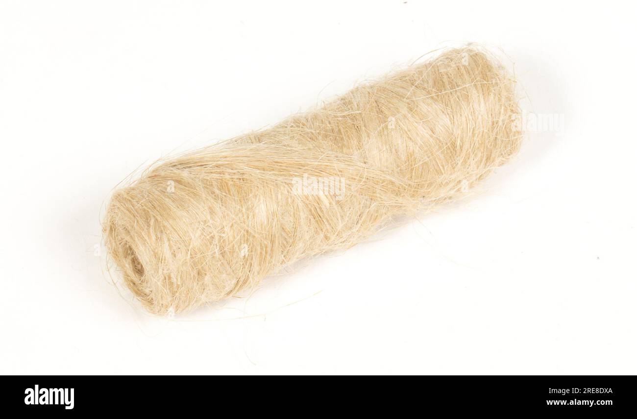 Fine hemp rope roll isolated on a white background Stock Photo - Alamy