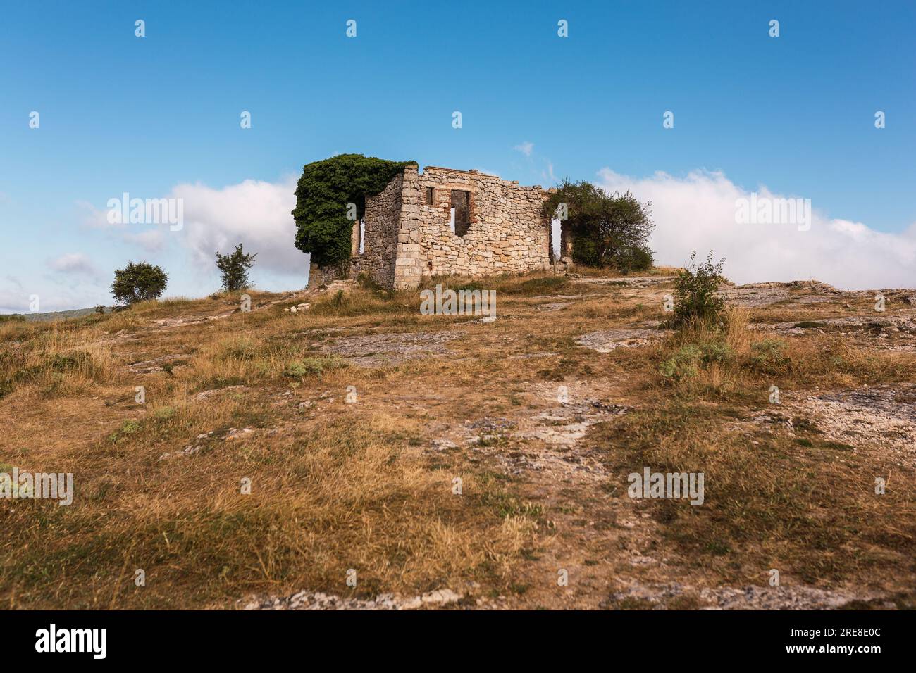 ruins of a house in La Mussara ,Tarragona, Spain, above everything on a ...