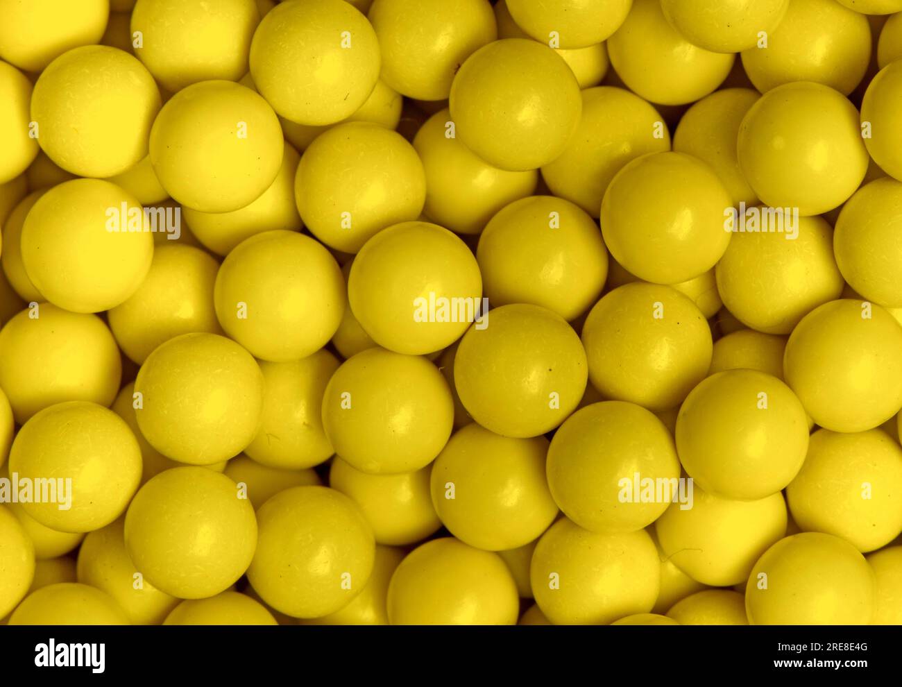 Small round balls, used for a toy gun Stock Photo - Alamy