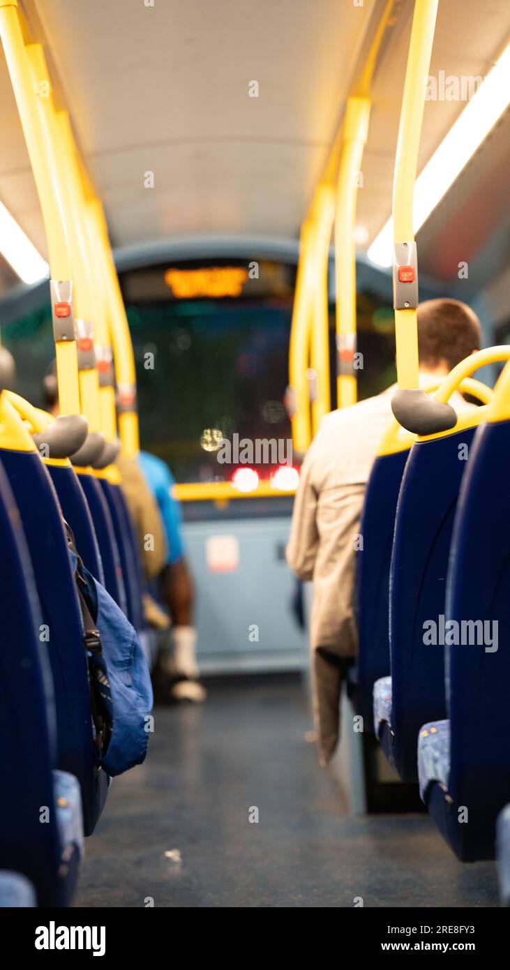 Interior of a London bus at night with passengers Stock Photo - Alamy