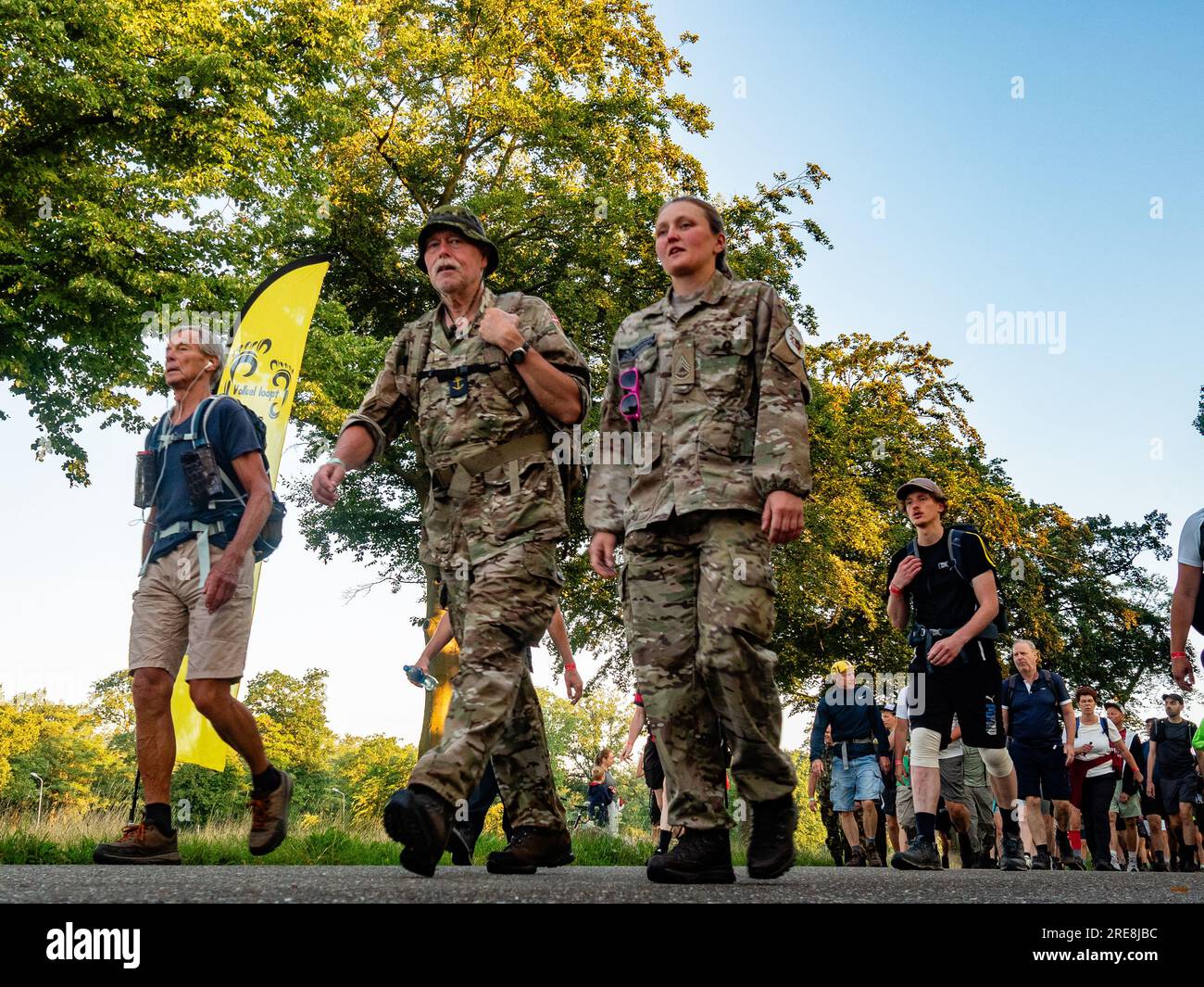Soldiers are seen walking next to civilian participants. Since it is ...