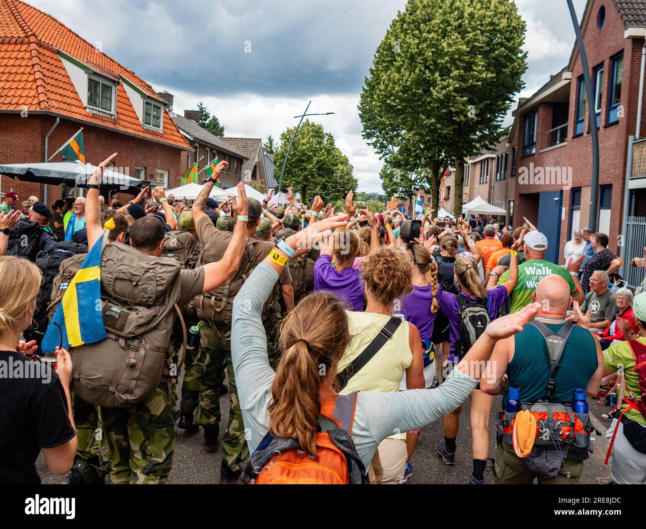 Participants are seen walking and dancing. Since it is the world's ...
