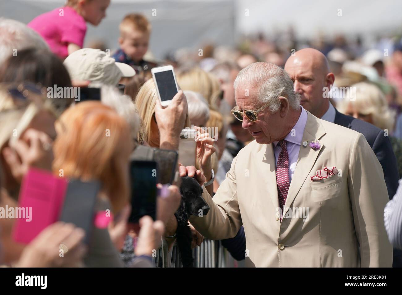 King Charles III greets members of the public during a visit to the ...