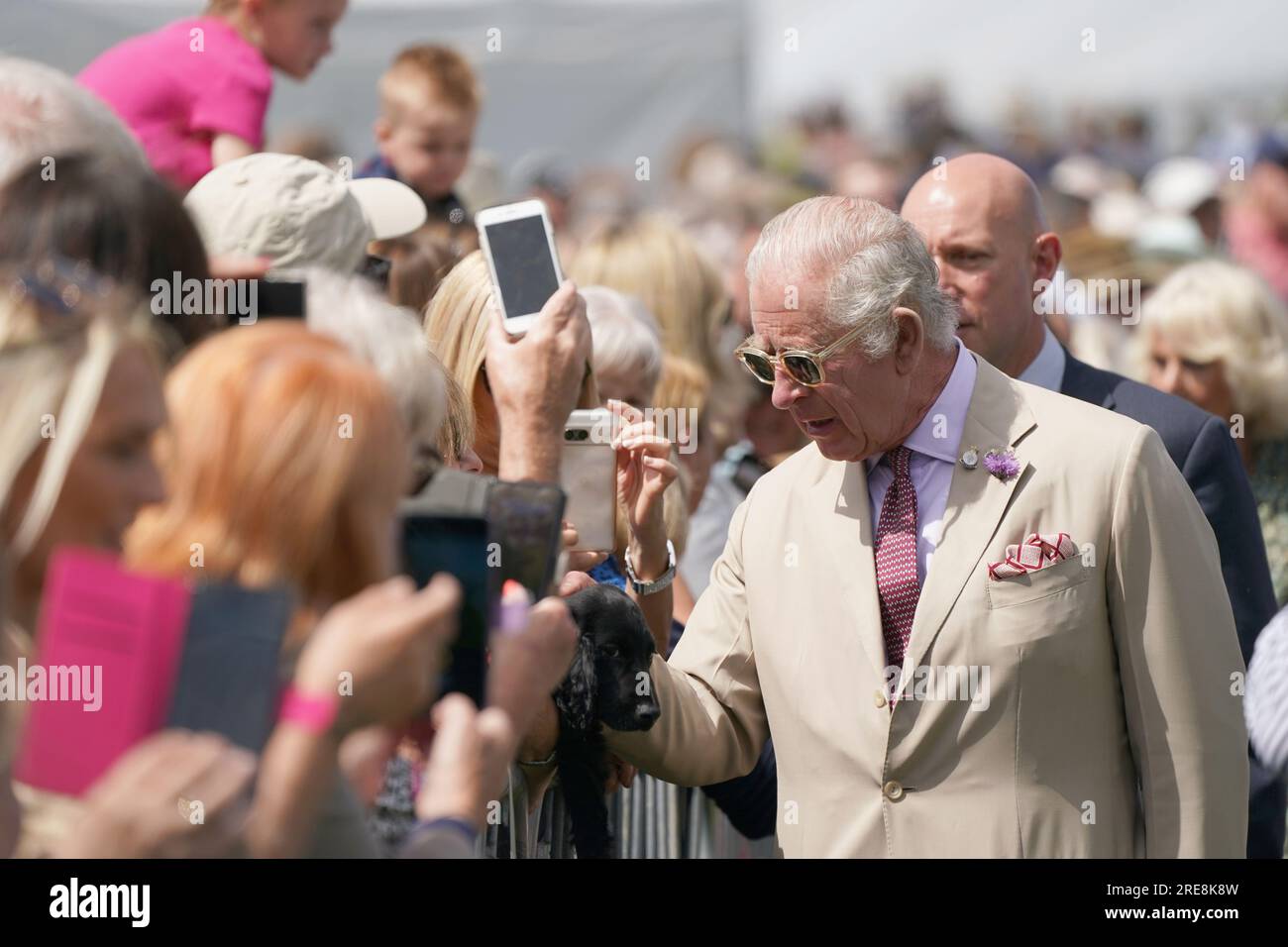 King Charles III greets members of the public during a visit to the ...