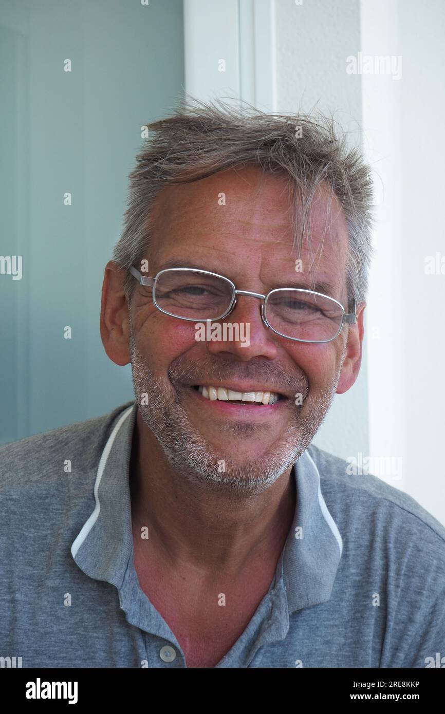 Older Man Tanned With Glasses Stock Photo - Alamy