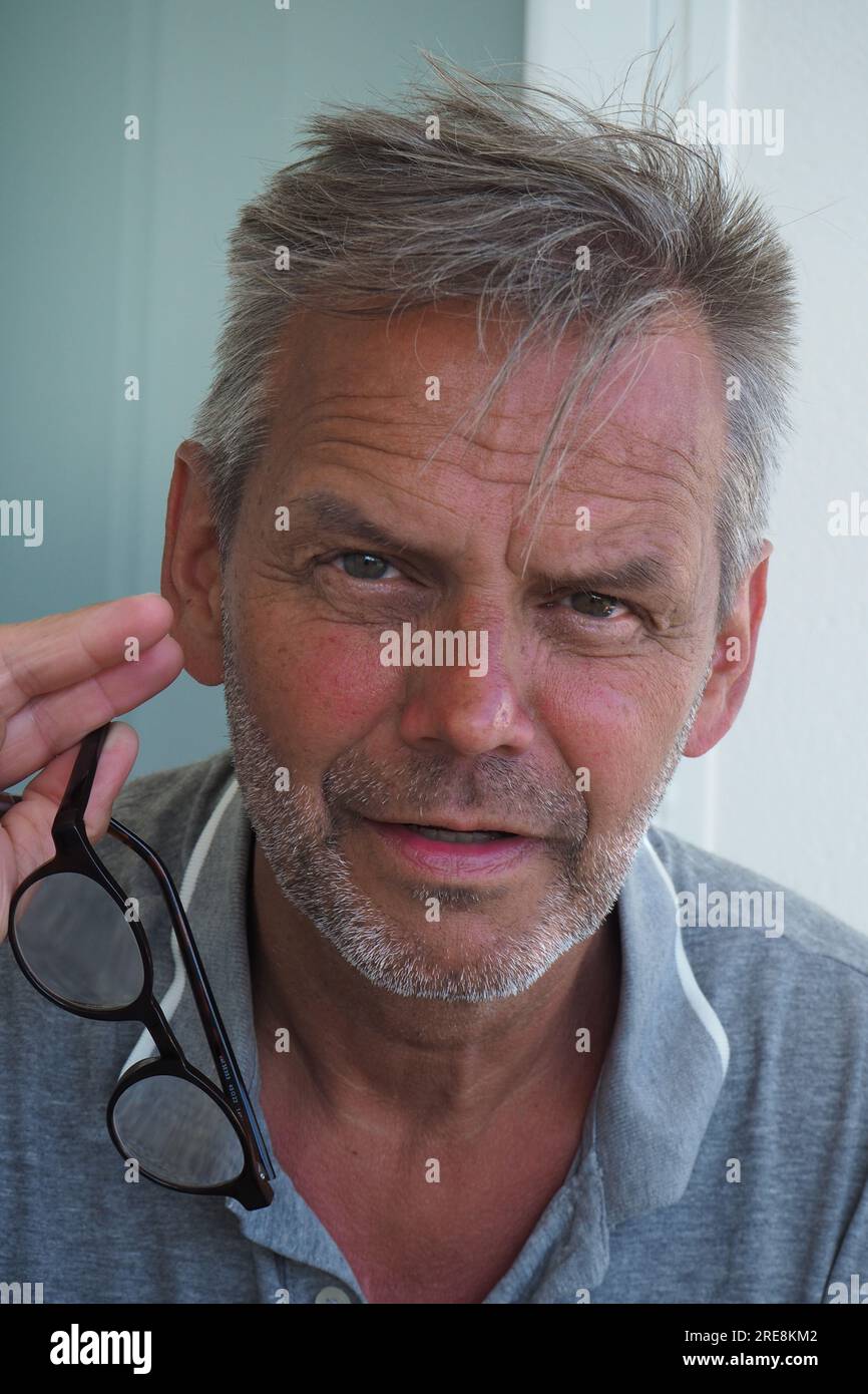 Older Man Tanned With Glasses Stock Photo - Alamy