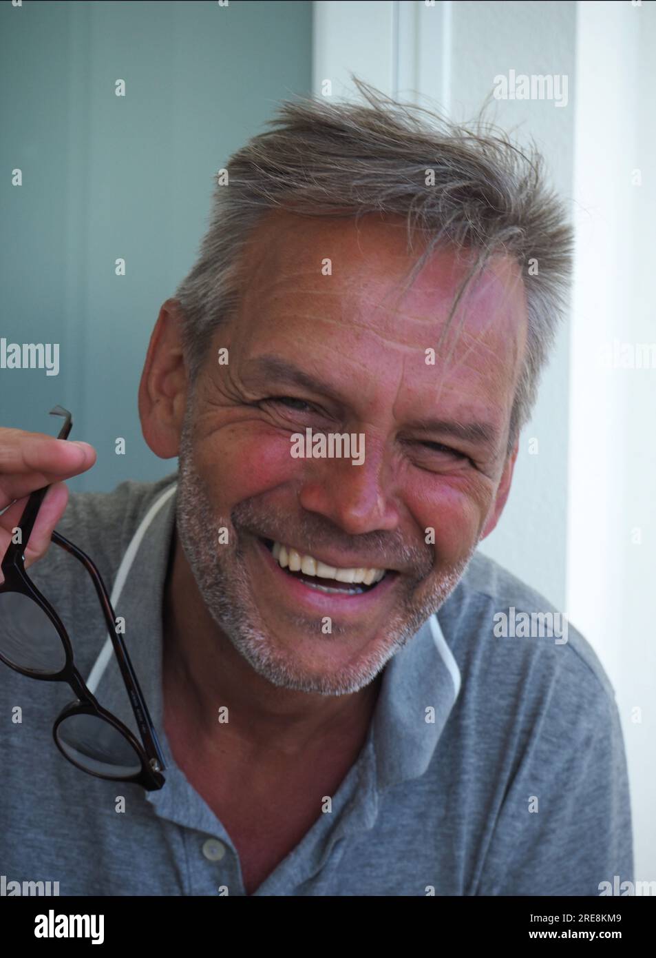 Older Man Tanned With Glasses Stock Photo - Alamy