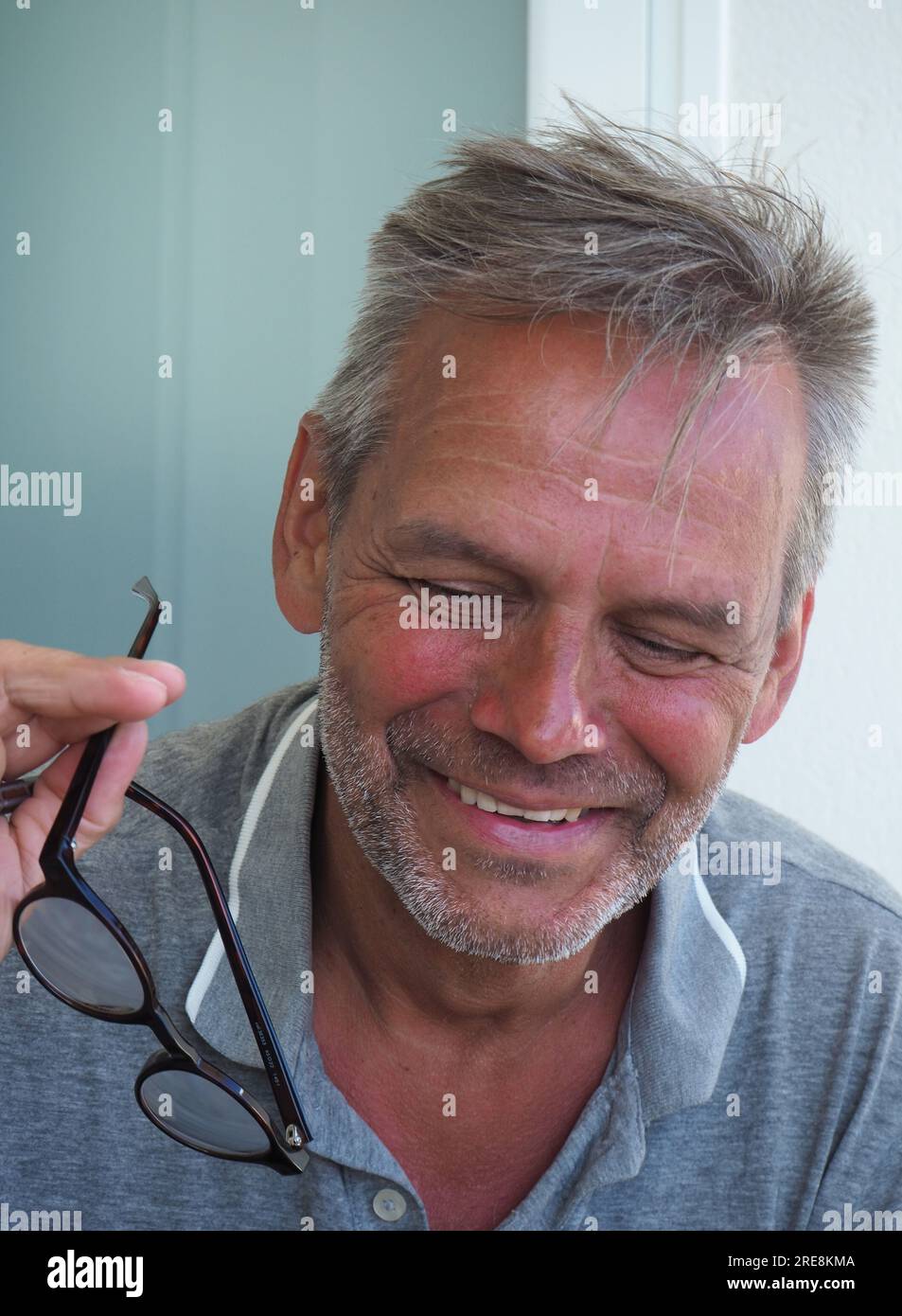Older Man Tanned With Glasses Stock Photo - Alamy