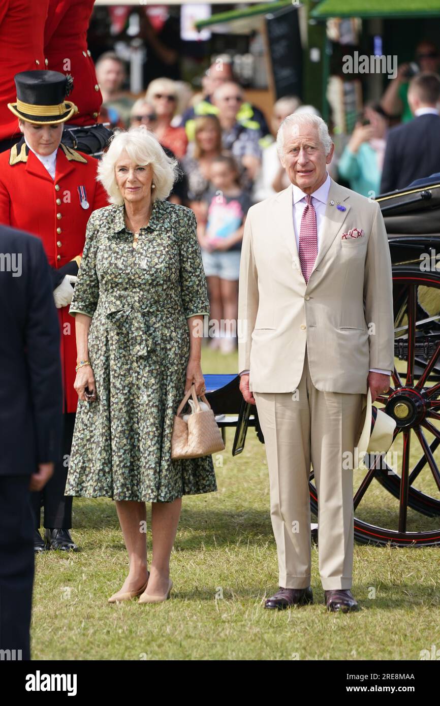 King Charles III and Queen Camilla stand for the national anthem during ...