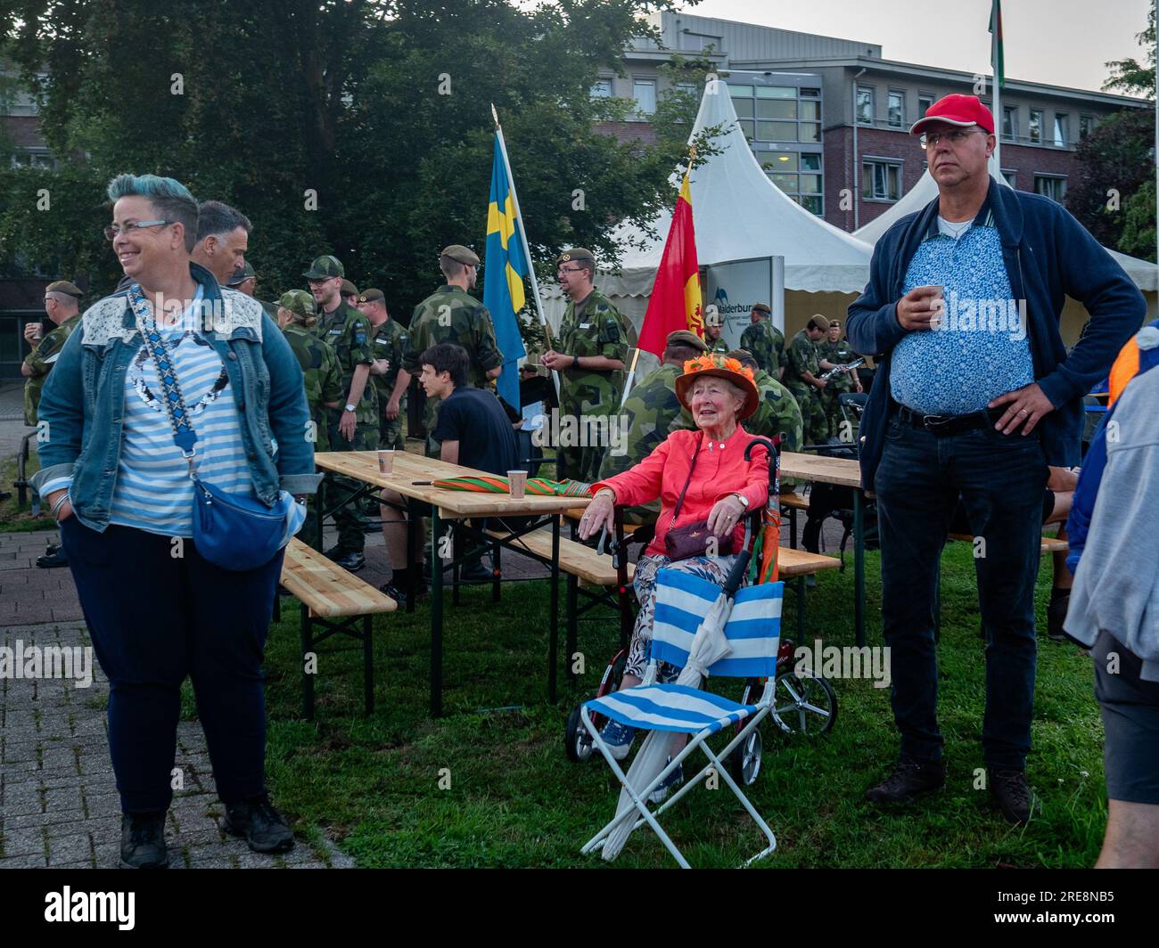 An old lady is seen the walkers passing by. Since it is the world's ...